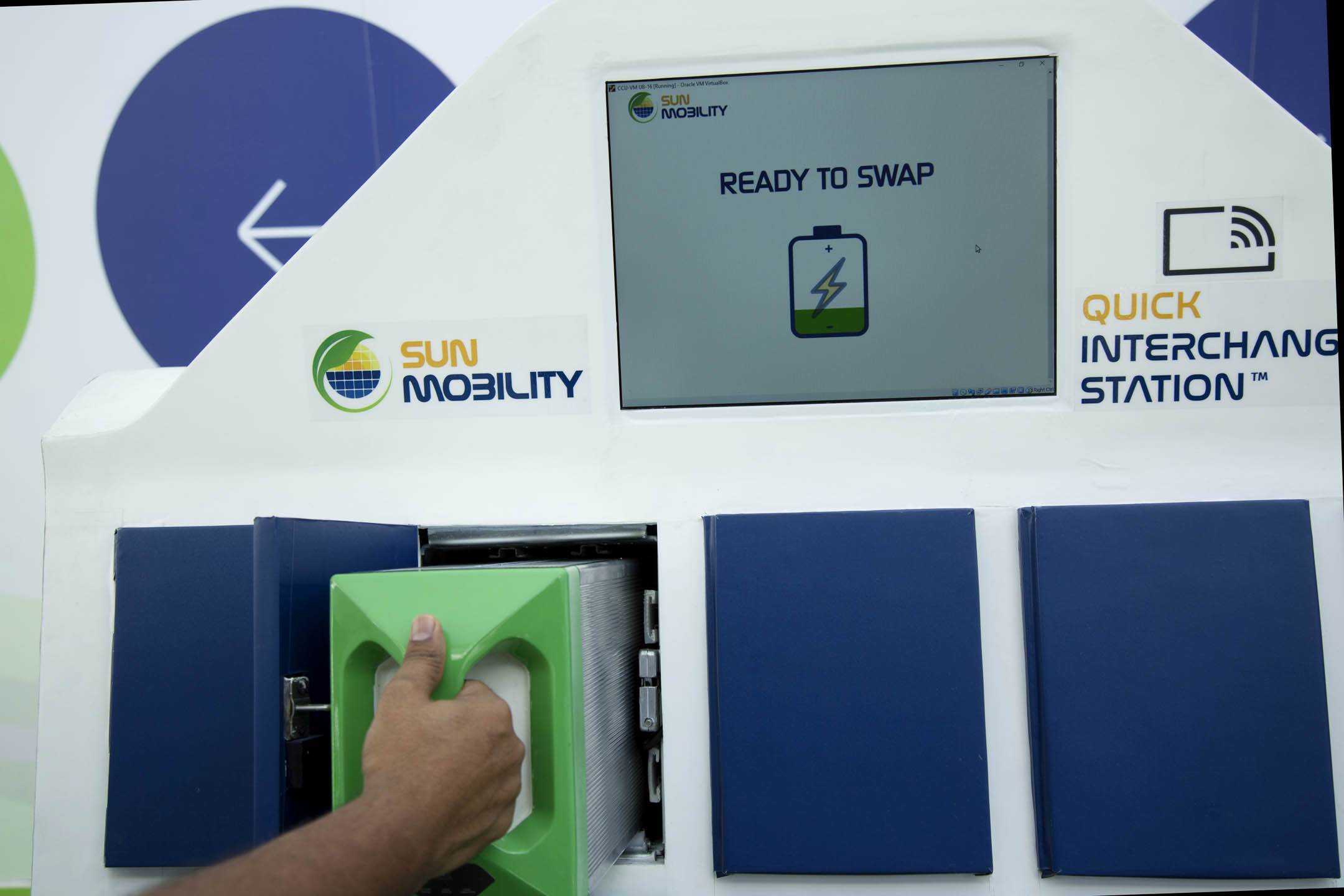 Sun Mobility reveals inter-operable battery swapping station for 2- and ...