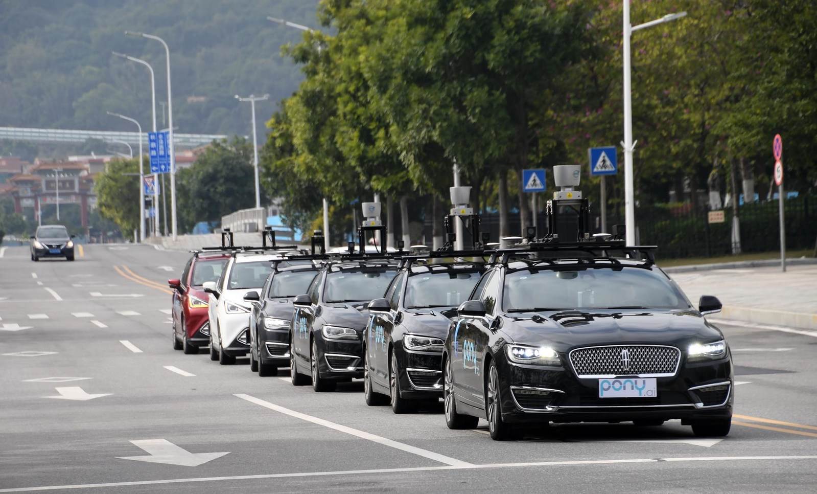 Chinese AI firm launches autonomous ride-sharing fleet, partners with ...