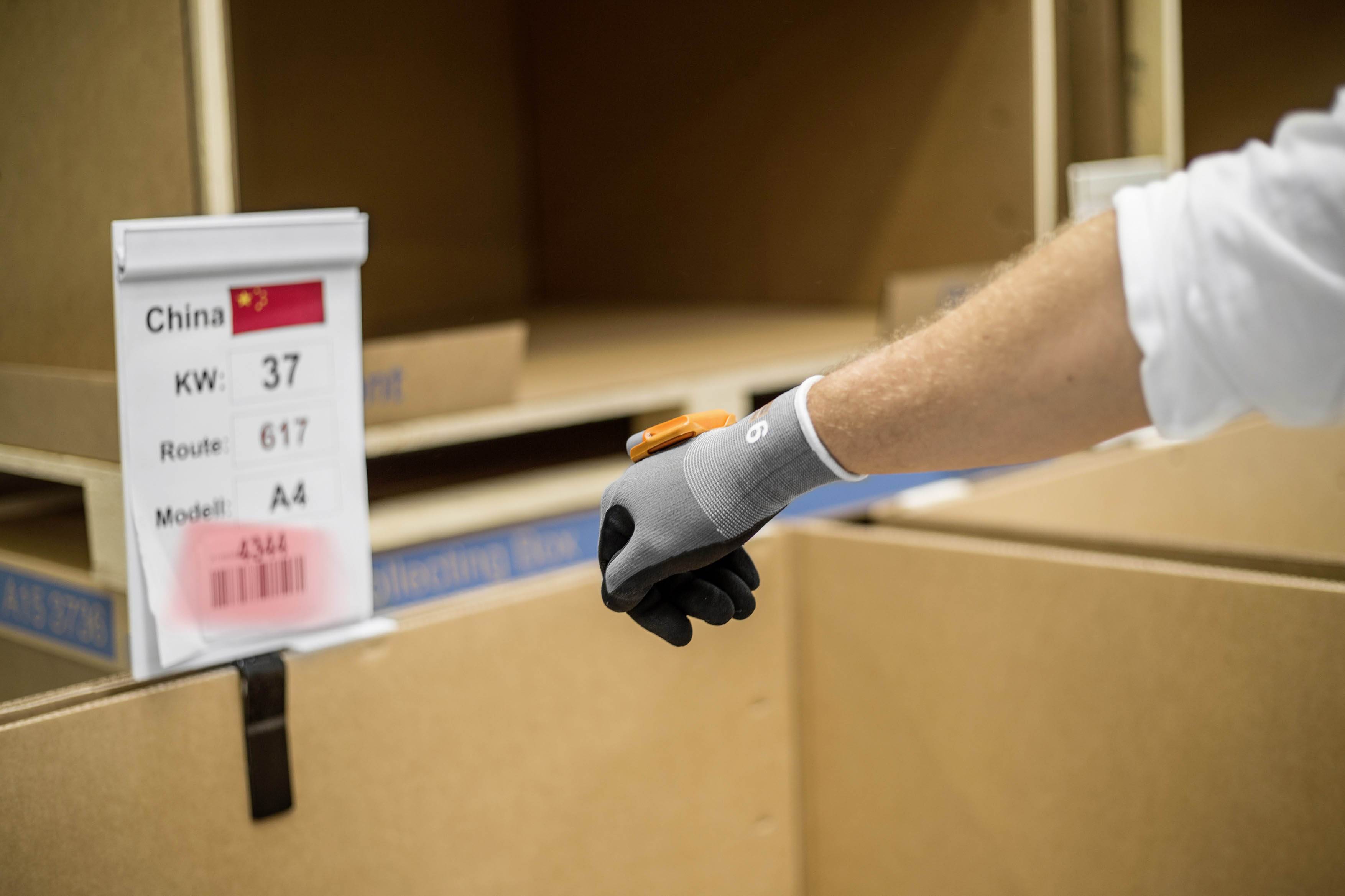 How scanner gloves are making work easier for logistics staffers ...